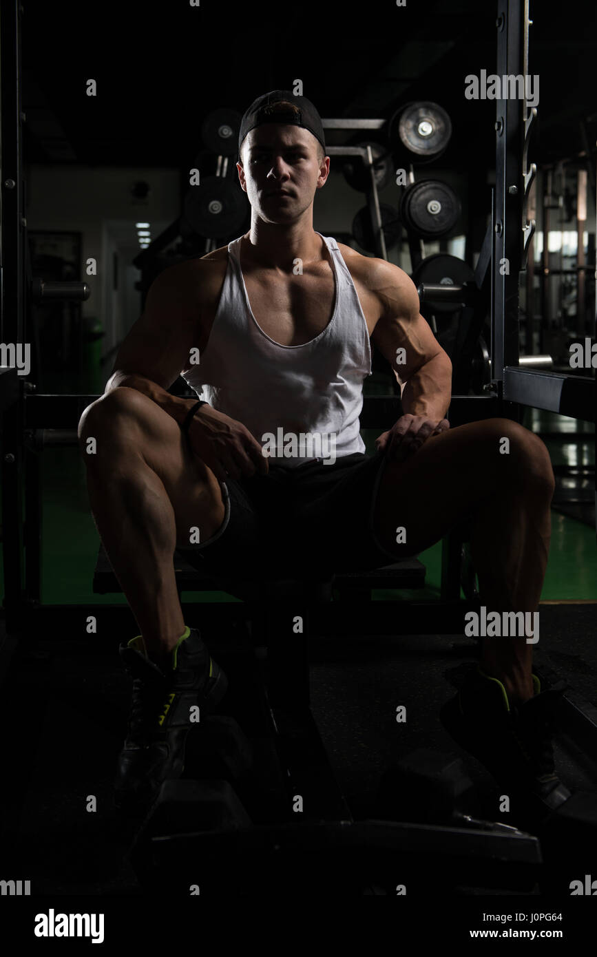 Resting Time - Confident Muscled Young Man Resting In Healthy Club Gym ...
