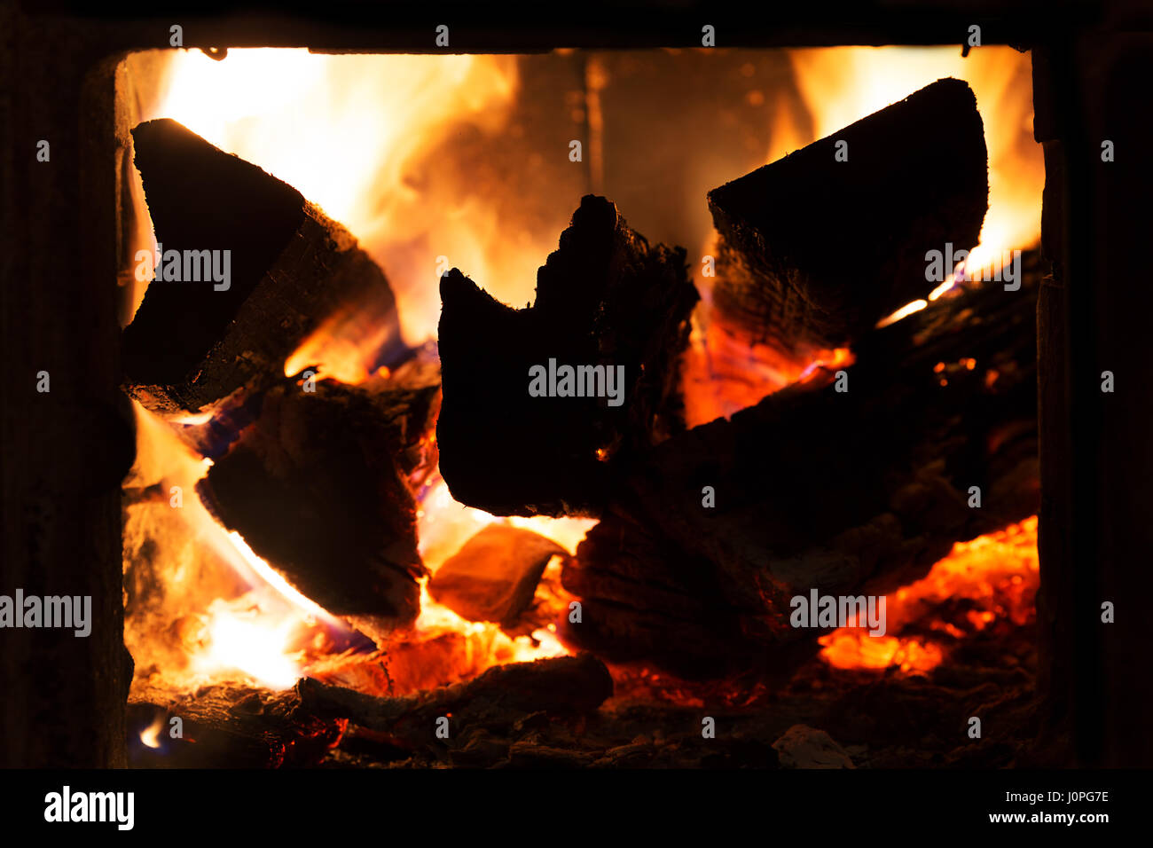 fire in a fireplace heat flame hot Stock Photo - Alamy