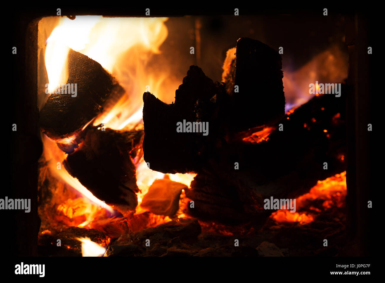 fire in a fireplace heat flame hot Stock Photo - Alamy