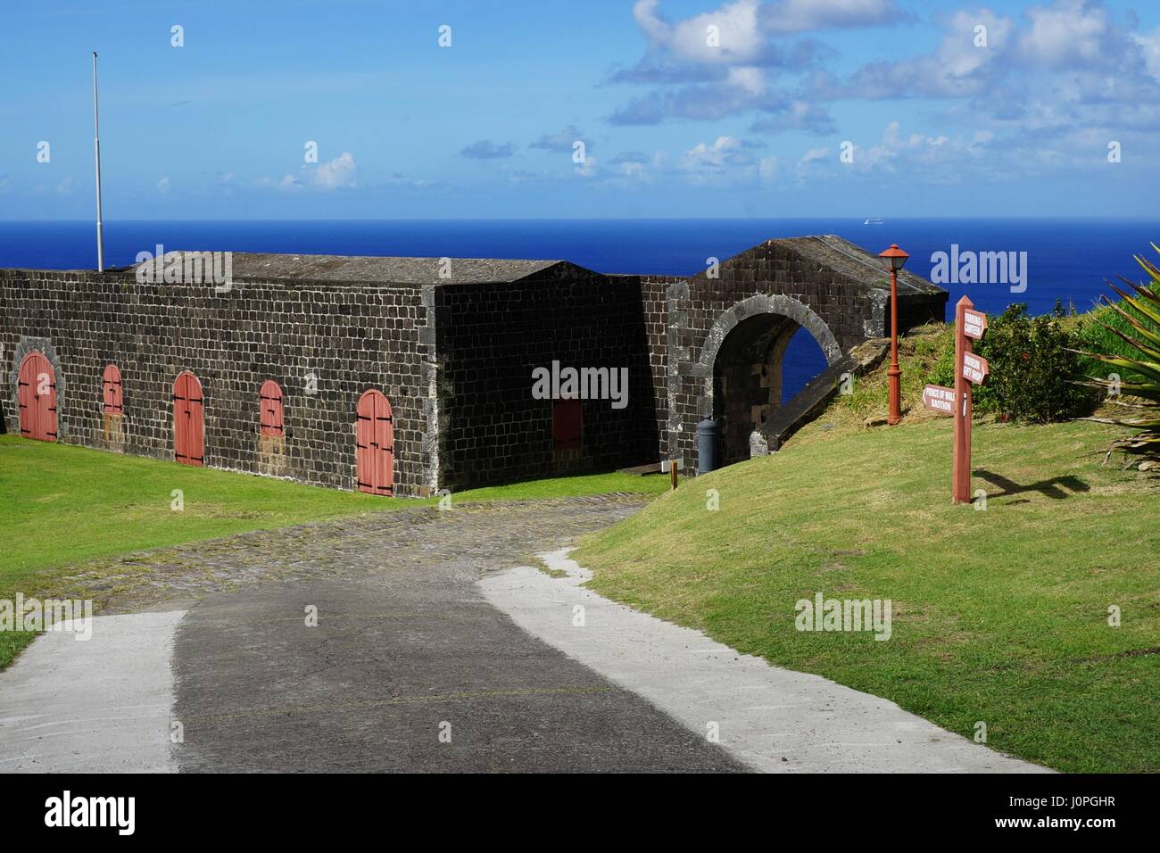 Brimstone Hill Fortress entrance gate and road with directions sign, St ...