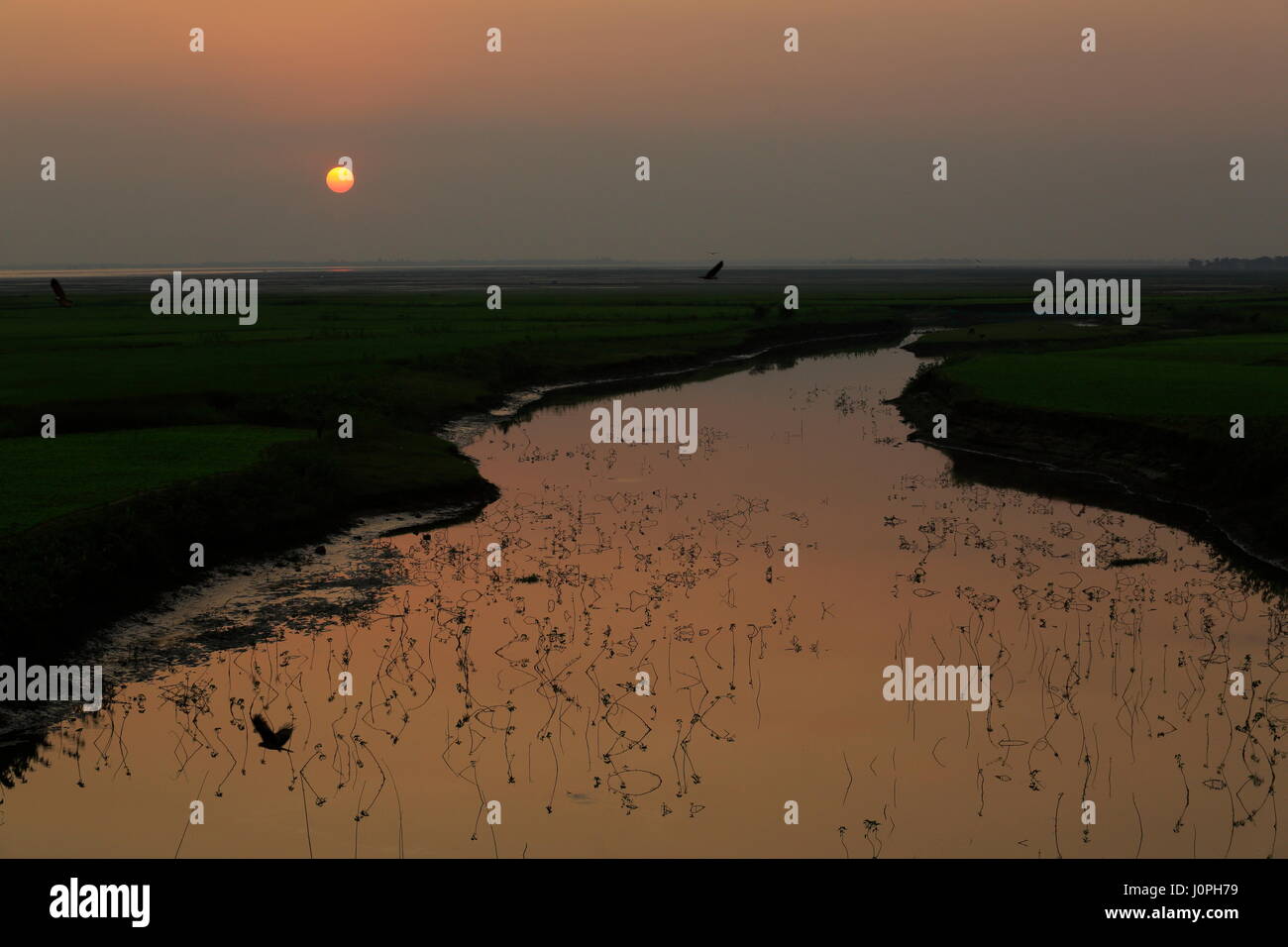 Sunset in Sunamganj, Bangladesh Stock Photo - Alamy