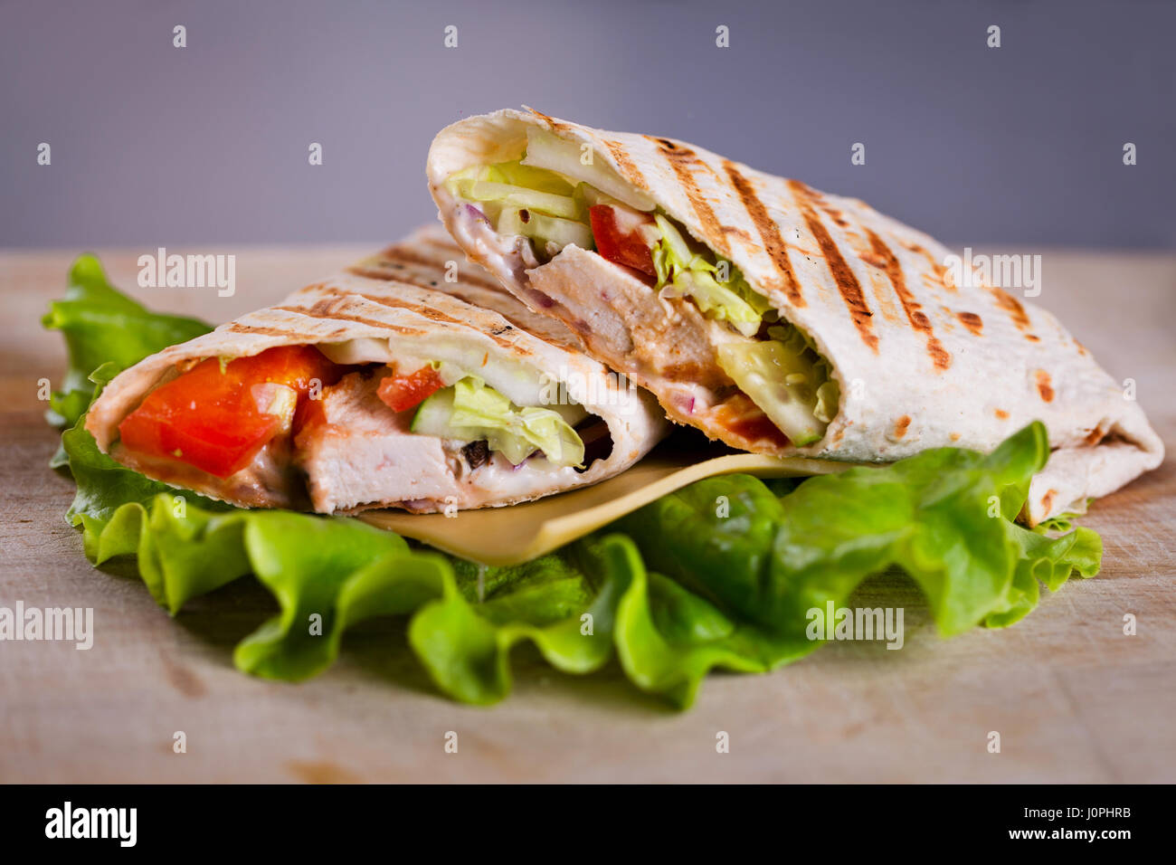 Cooking fresh home made chicken wrap tortilla Stock Photo - Alamy
