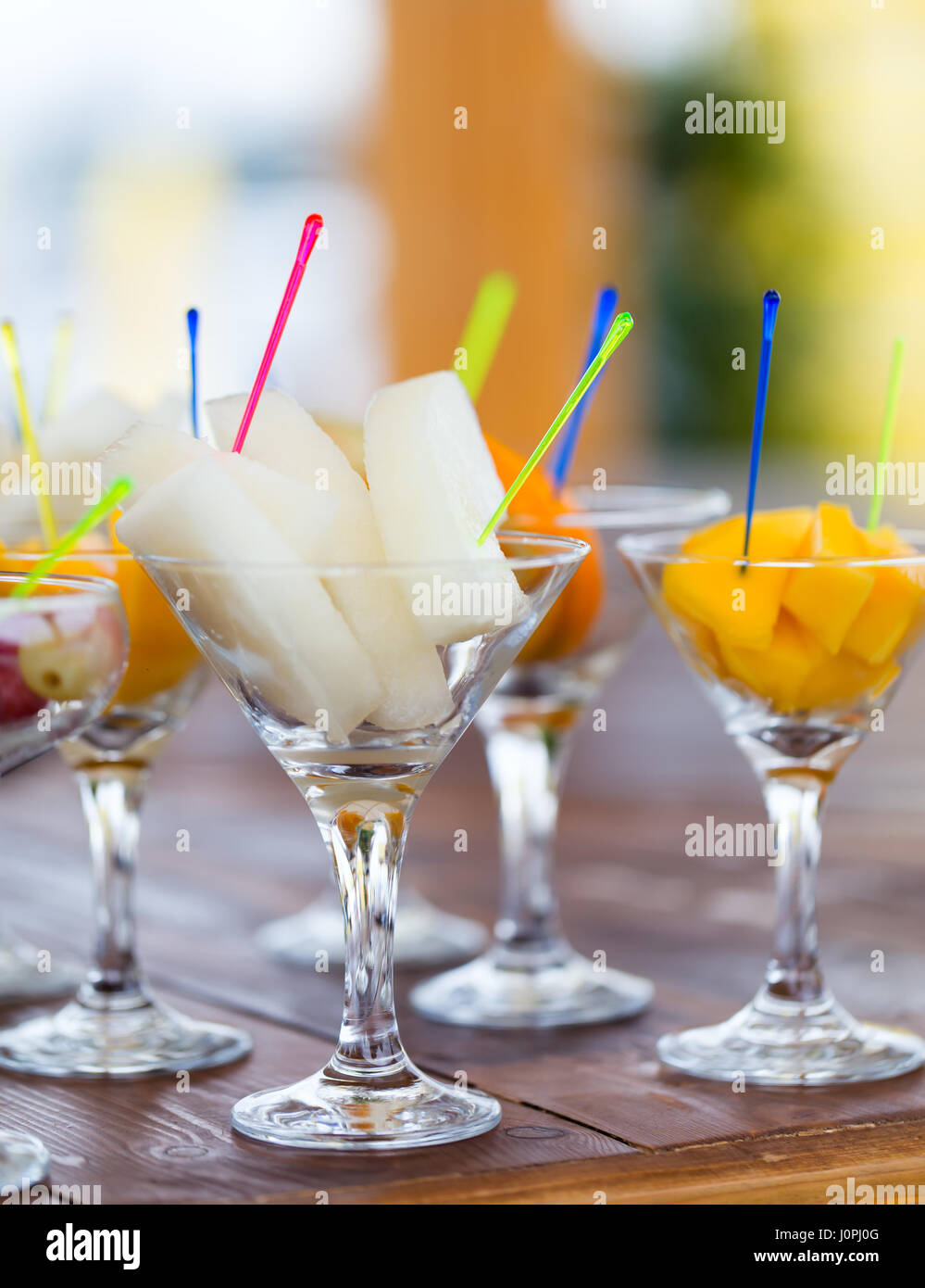 Fresh fruit cuts in nice champagne party glasses Stock Photo - Alamy