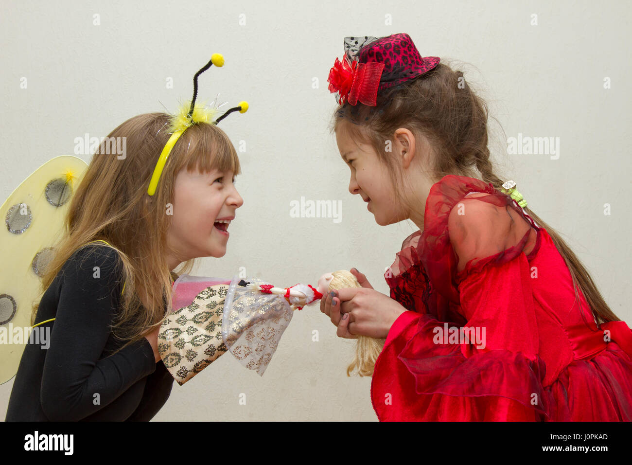 the conflict between two sisters. the kids are fighting, fight over for ...