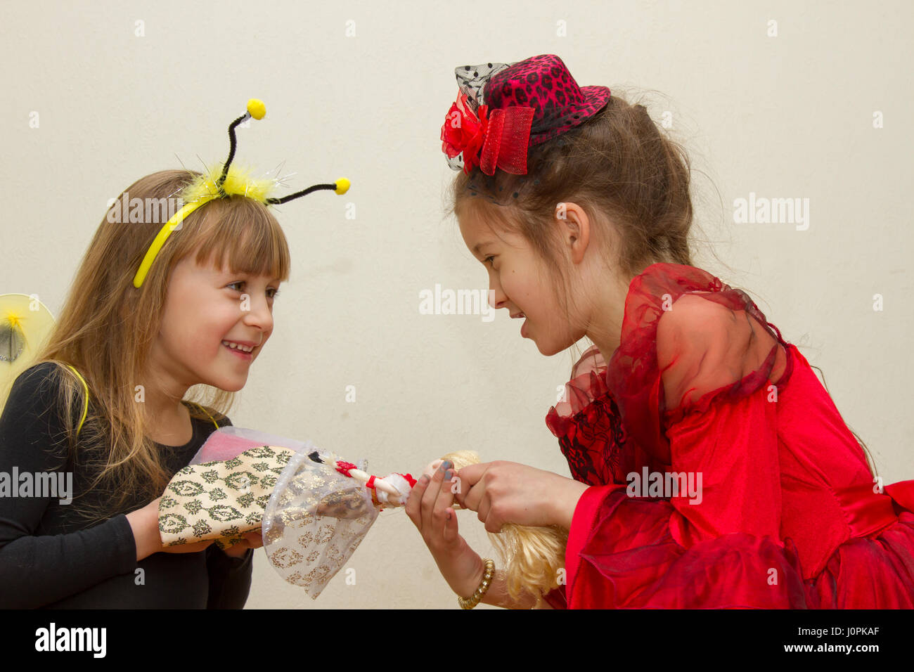 Two girls fight toy hi-res stock photography and images - Alamy