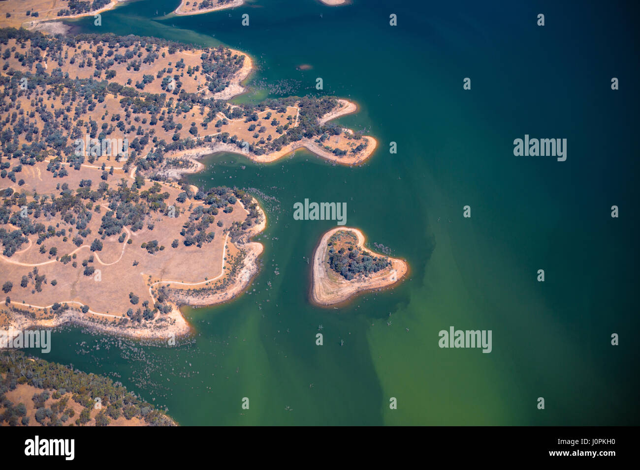 An aerial view of the shoreline of a man-made dam in Victoria ...