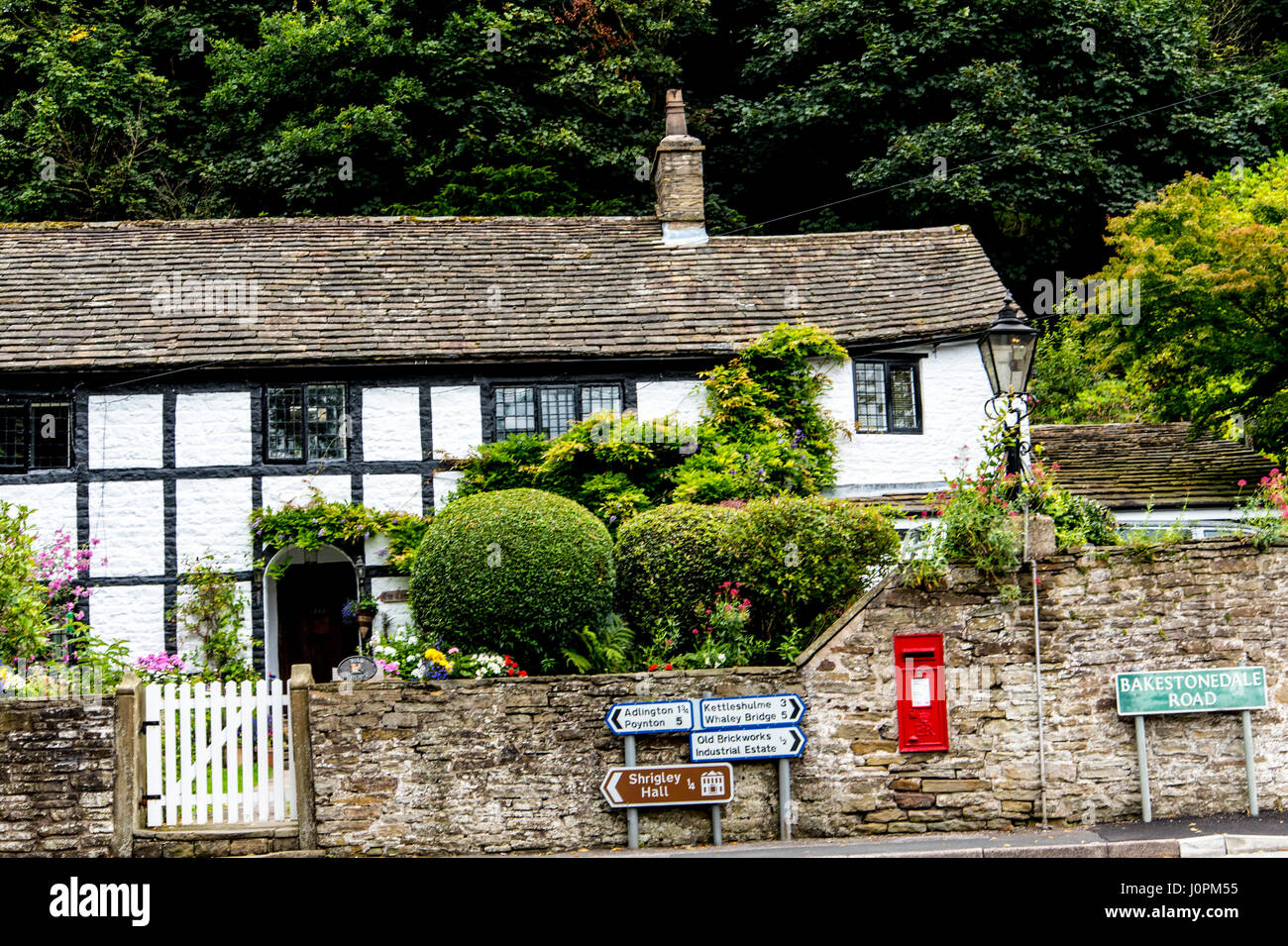 Cottage opposite from St Christopher`s Church in the small village of ...