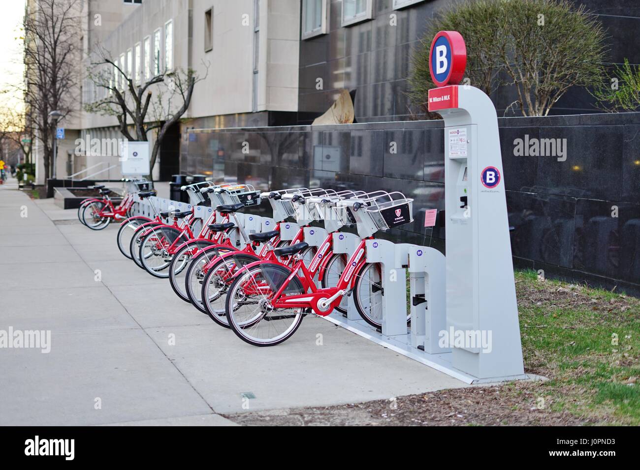 View of red B-Cycles share bicycles lined up in the streets of the ...