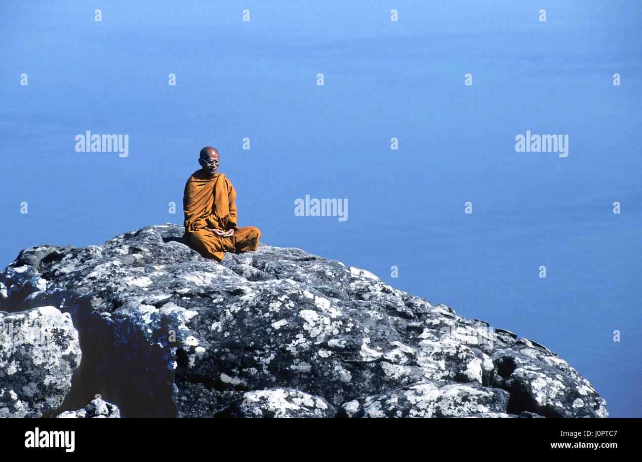 Buddhist Monk meditating Table Mountain Cape Town South Africa Stock ...