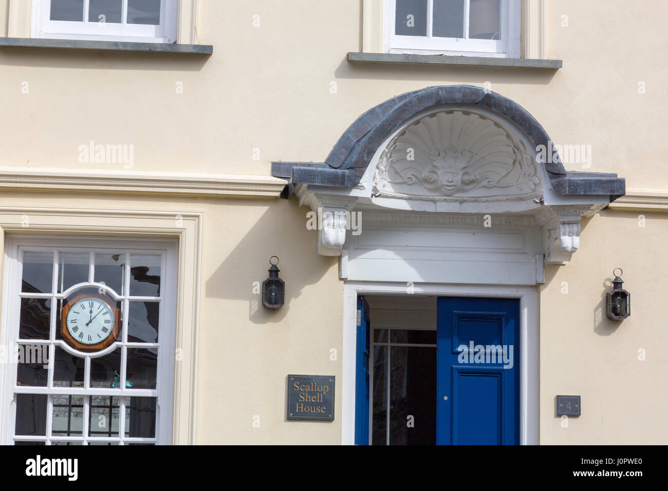 Interesting architectural details above the door and in the clock ...