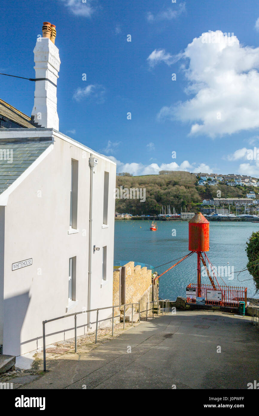 The bright red Whitehouse Point lighthouse in the historic port of ...