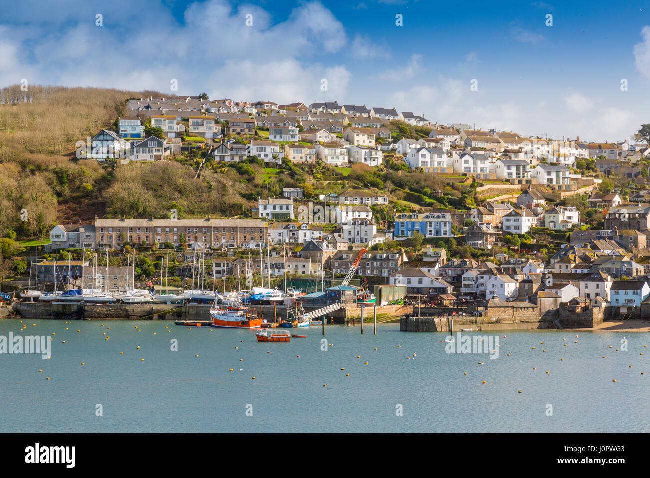 Looking across the Fowey River to the historic port of Polruan with its ...