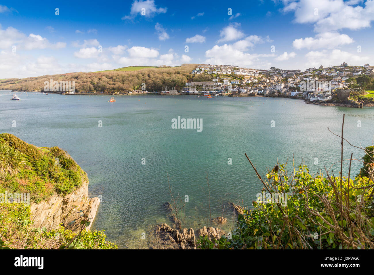 Looking across the Fowey River to the historic port of Polruan with its ...