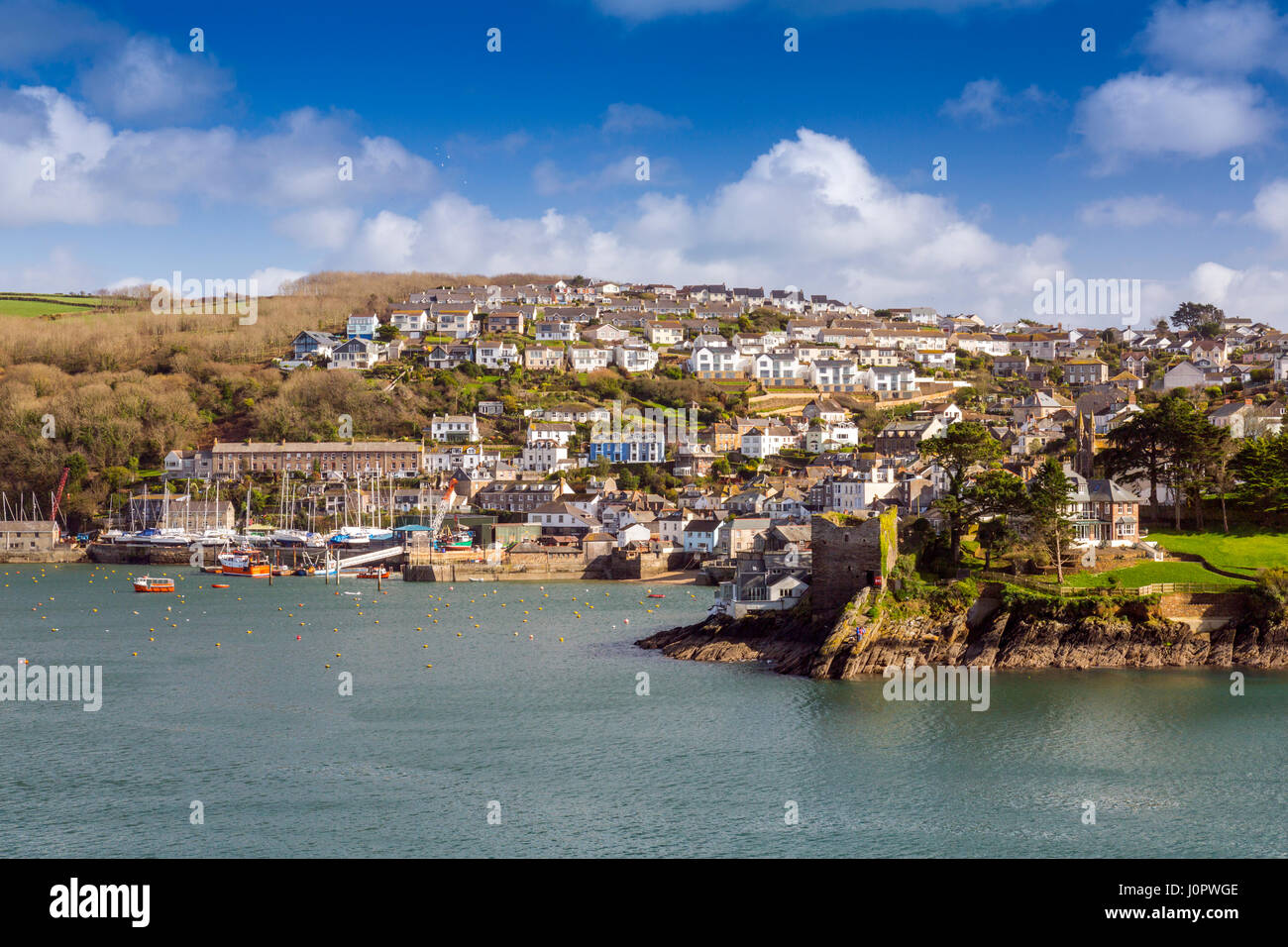 Looking across the Fowey River to the historic port of Polruan with its ...