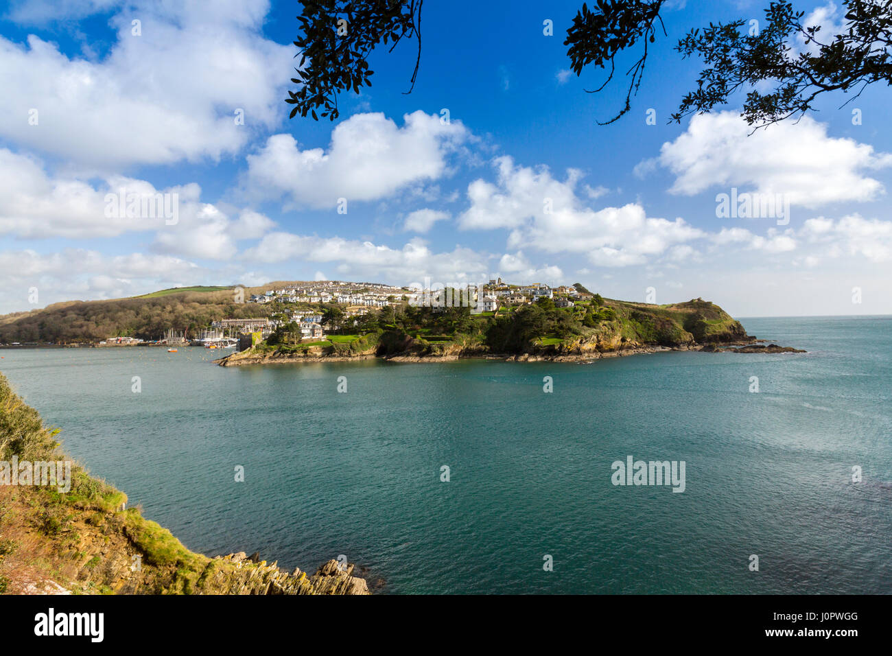 Looking across the Fowey River to the historic port of Polruan with its ...