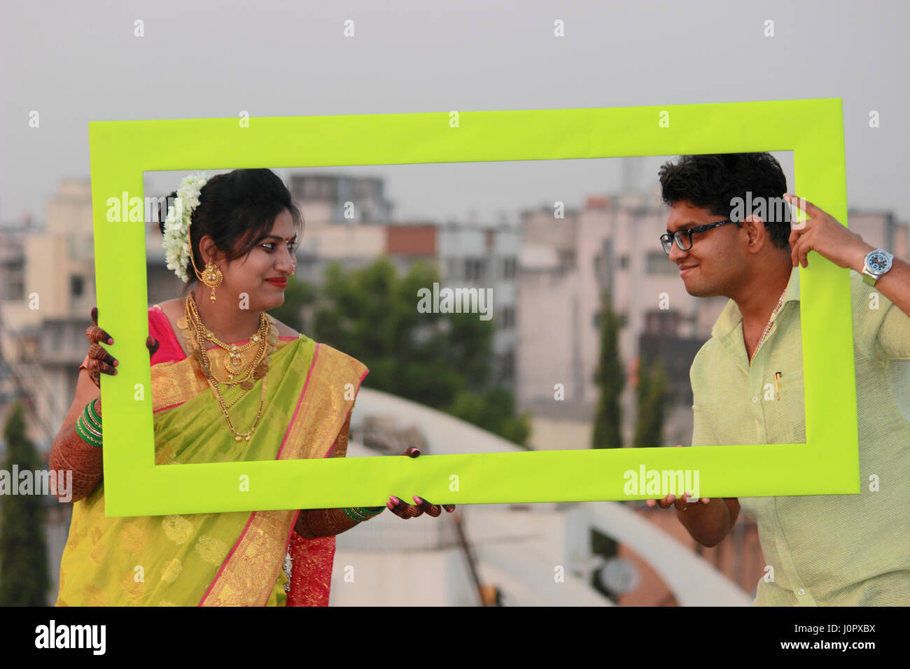 Indian family photo frame hi-res stock photography and images - Alamy