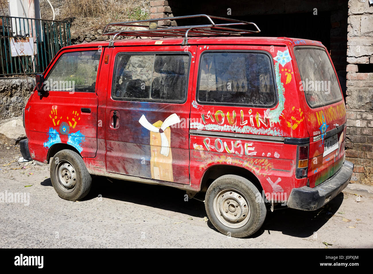 Graffiti painted on red van car Stock Photo - Alamy