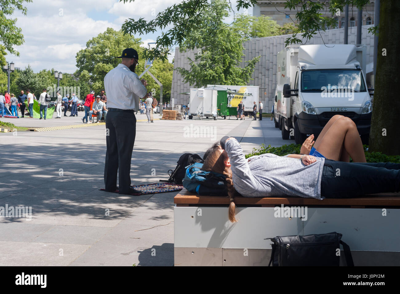 10.06.2016, Berlin, Germany - A Muslim man prays on his own prior to ...