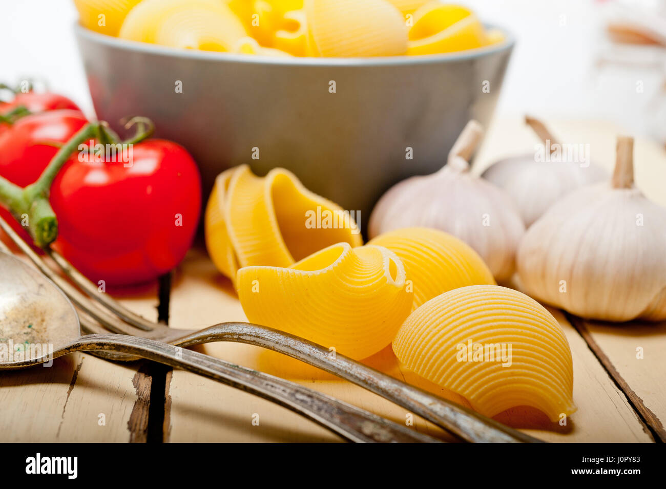 Italian snail lumaconi pasta with ripe cherry tomatoes sauce ...