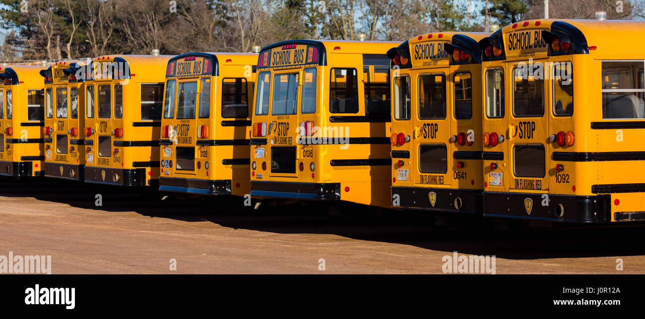 School buses row hi-res stock photography and images - Alamy
