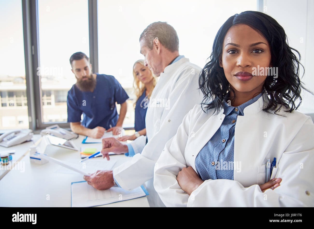 Female medic standing african hi-res stock photography and images - Alamy