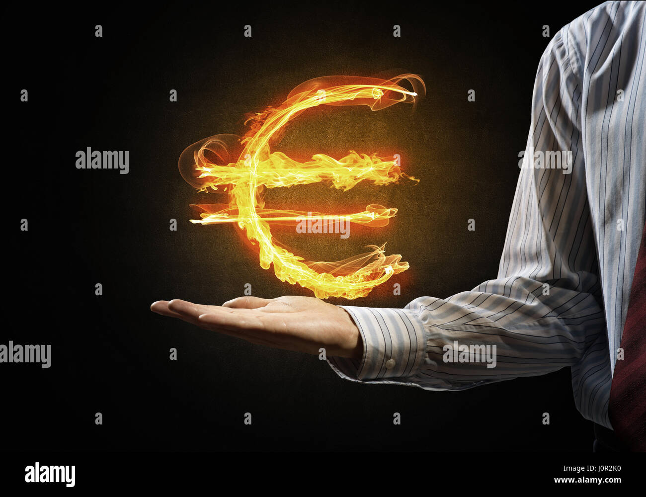 Euro currency fire symbol Stock Photo - Alamy