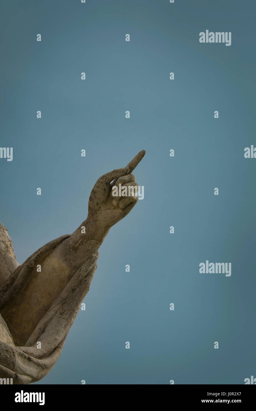 Element of the statue, hand pointing at the sky Stock Photo - Alamy