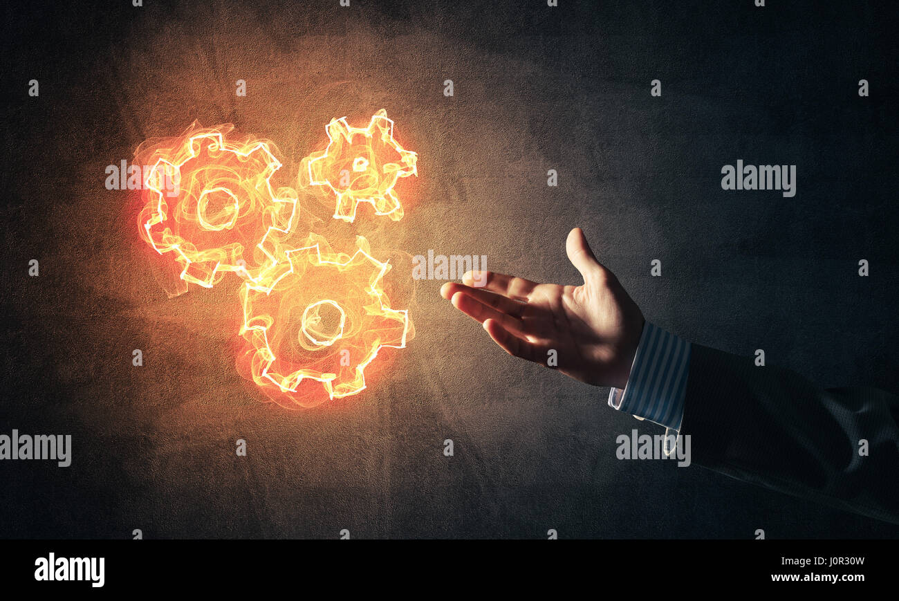 Concept of teamworking or organization presented by fire glowing Stock ...