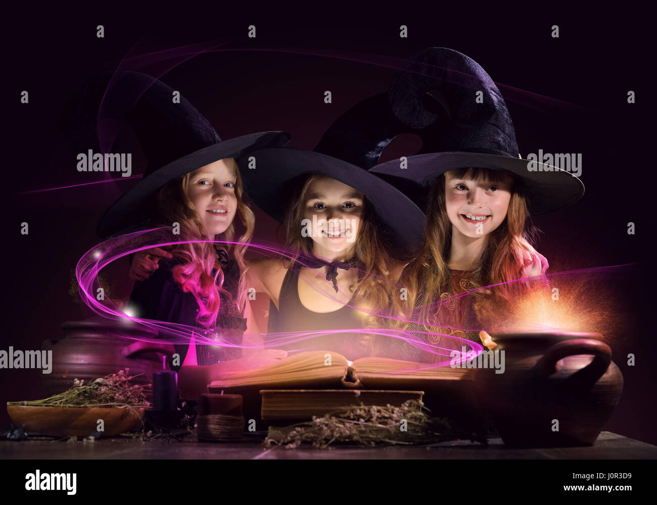 Three little witches Stock Photo - Alamy