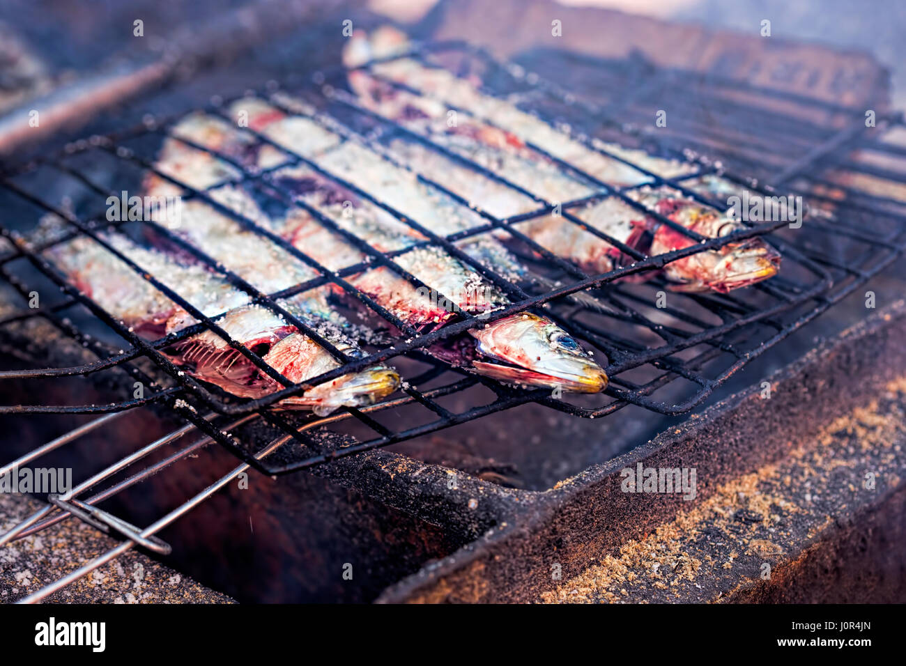 Sardines on barbecue Morocco Stock Photo - Alamy