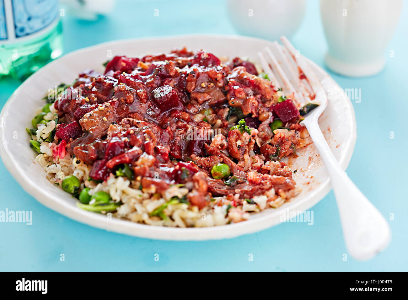 Shredded beef brisket with beetroot and brown rice Stock Photo - Alamy