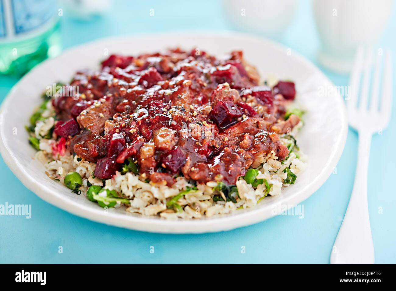 Shredded beef brisket with beetroot and brown rice Stock Photo - Alamy