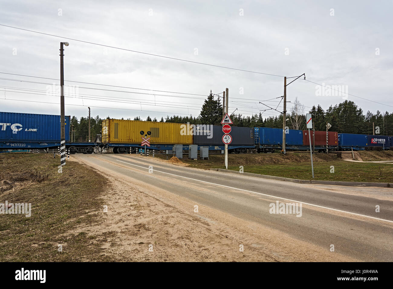 Railway structure with sea containers Stock Photo - Alamy