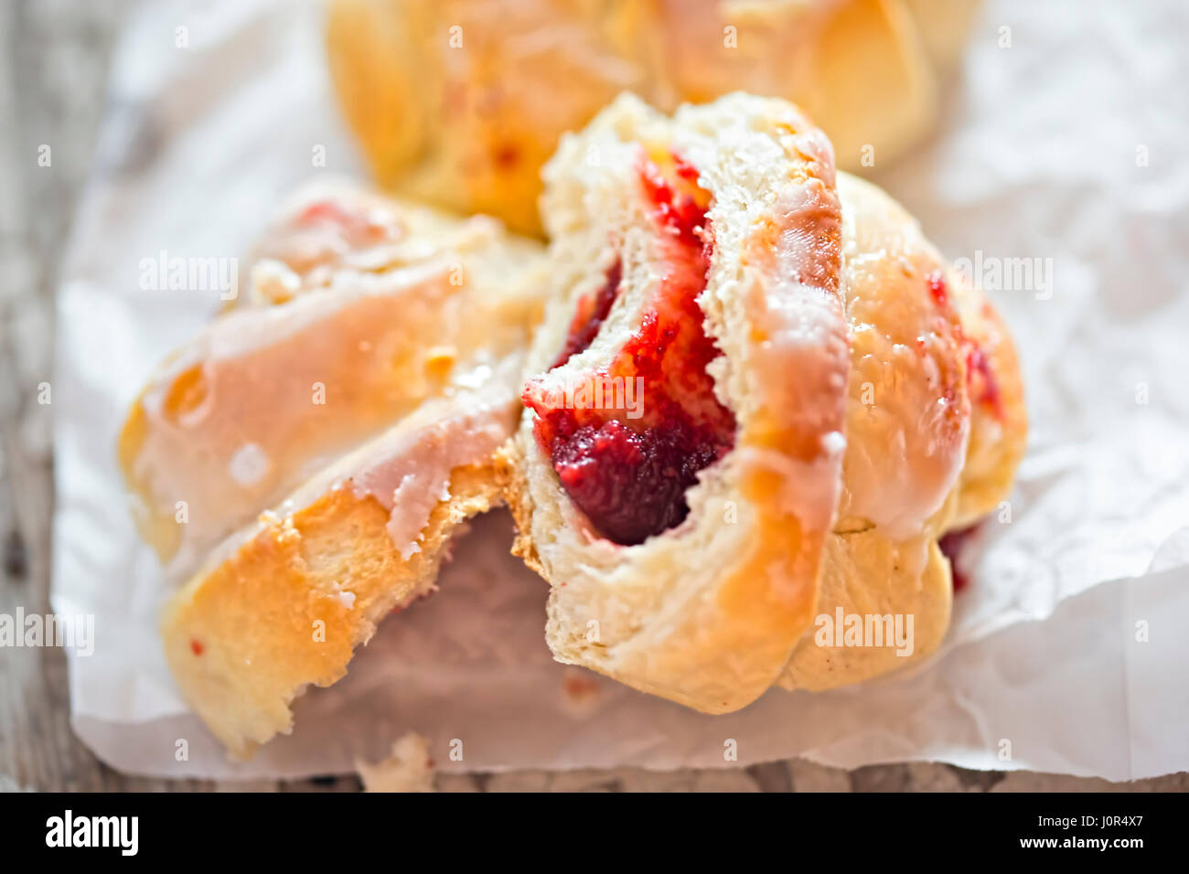 Croissants with strawberry jam Stock Photo - Alamy