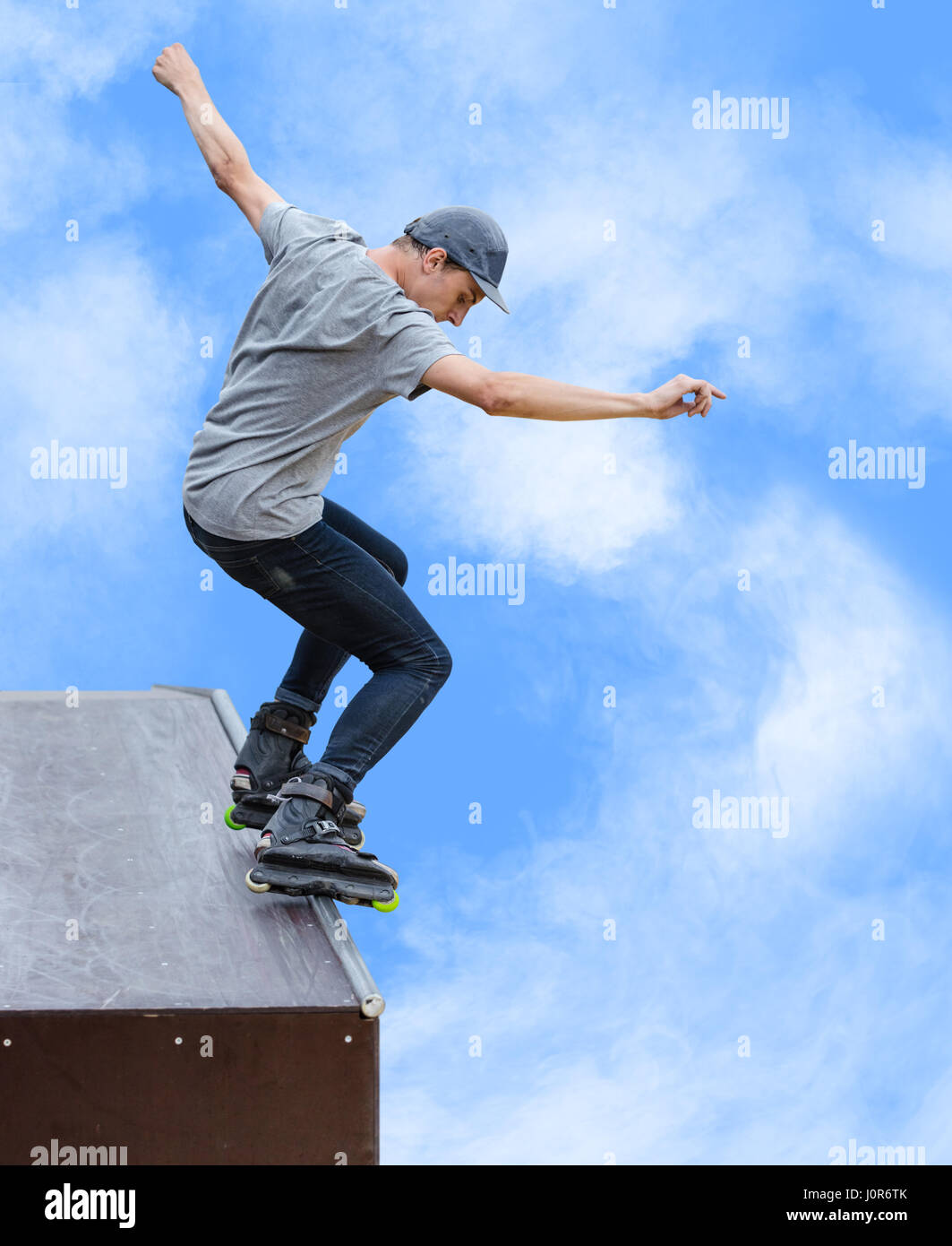 Extreme street sport, the roller performs a trick Stock Photo - Alamy