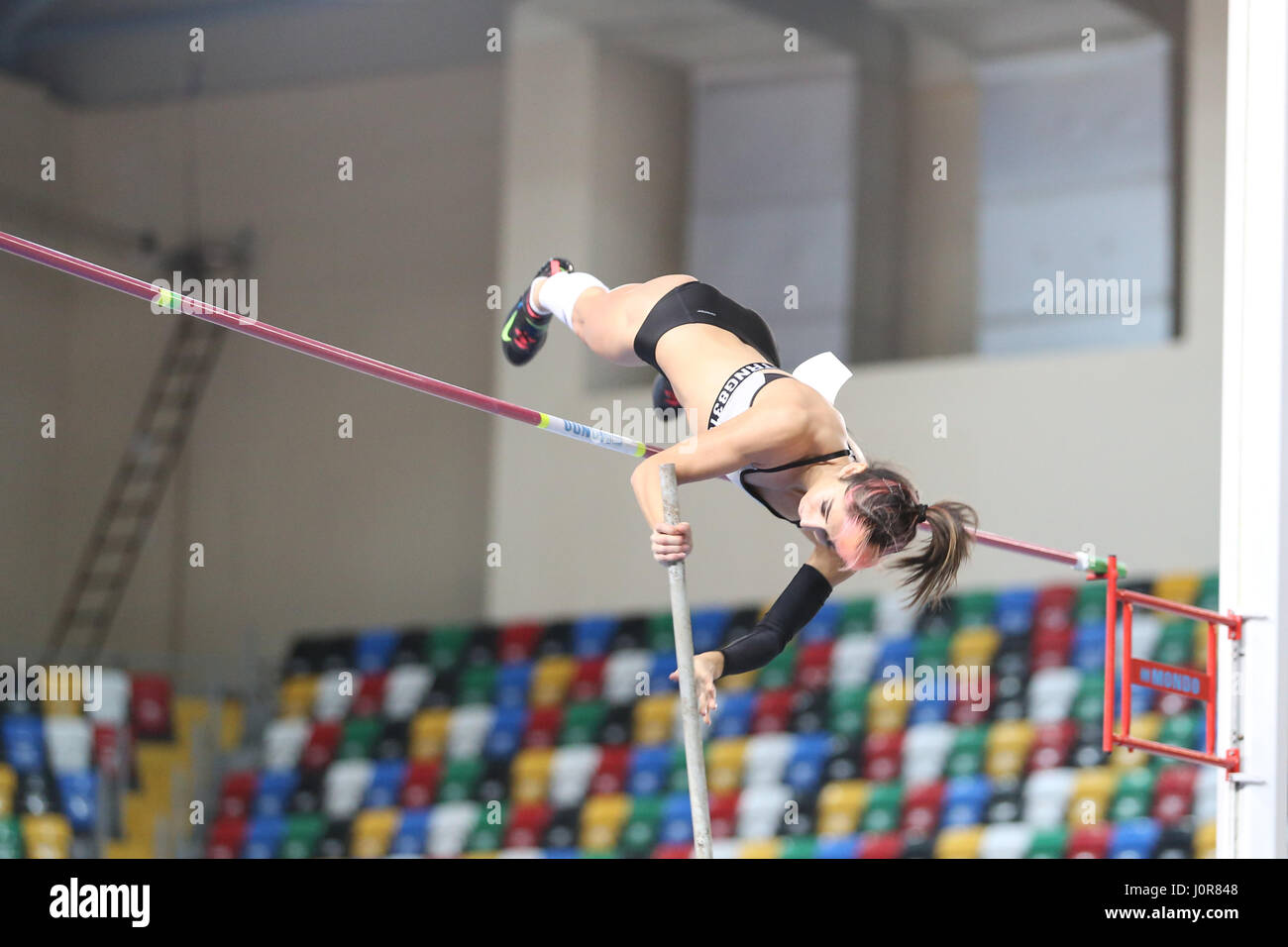 ISTANBUL, TURKEY - JANUARY 14, 2017: Athlete Buse Arikazan pole ...