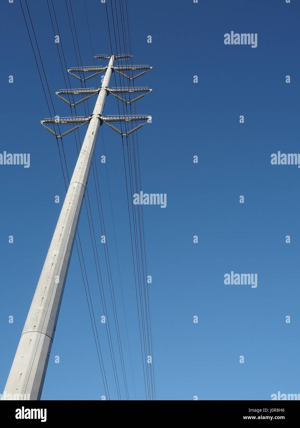 high voltage mono pole transmission line Stock Photo - Alamy