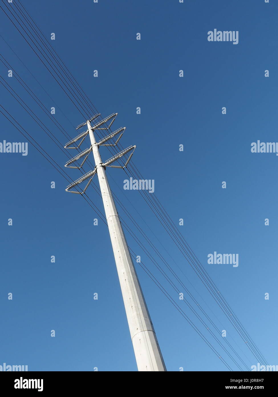 high voltage mono pole transmission line Stock Photo - Alamy
