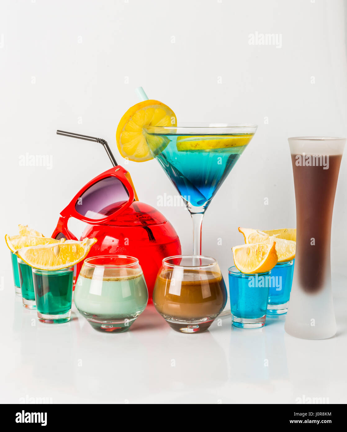 Colorful drink in a martini glass, blue and green combination, nine ...