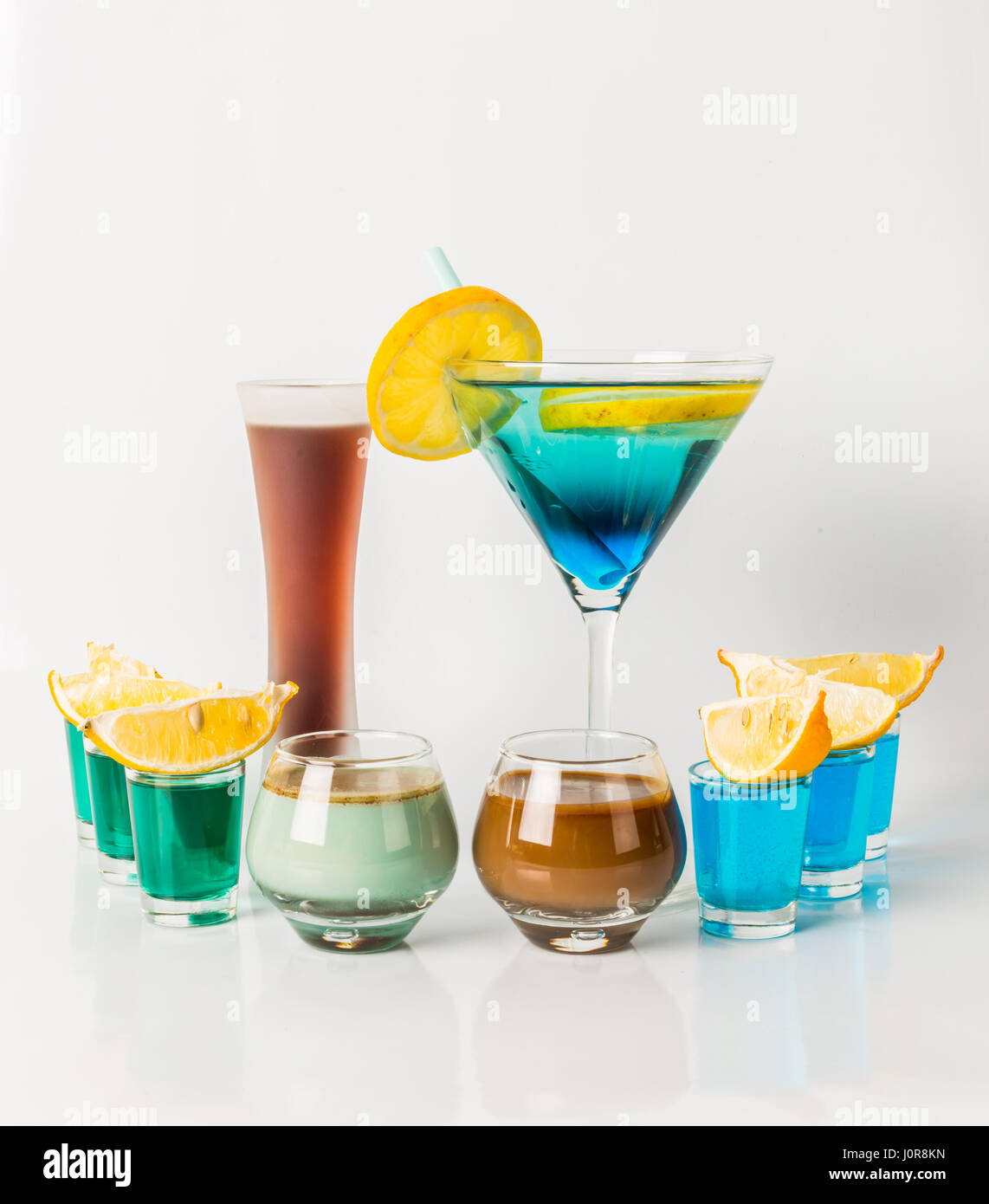 Colorful drink in a martini glass, blue and green combination, nine ...