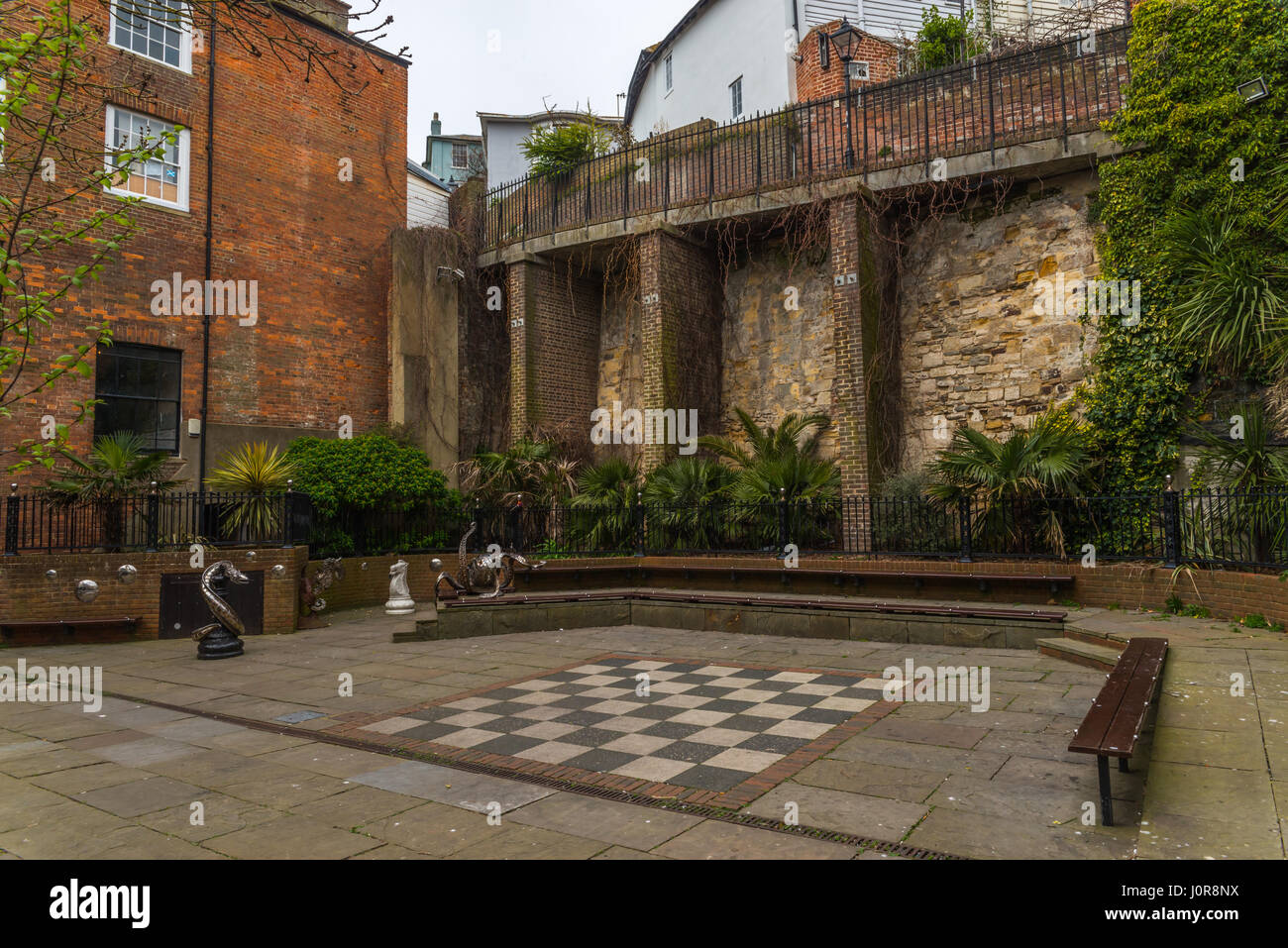 nice corner in the center of the city, a chess board located in a large ...
