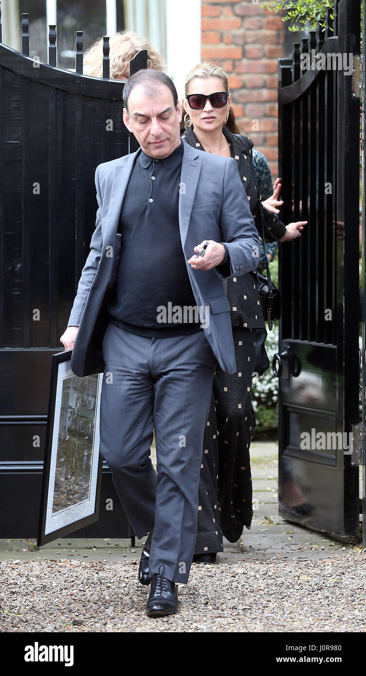 Kate Moss leaves her North London home with her driver carrying what ...