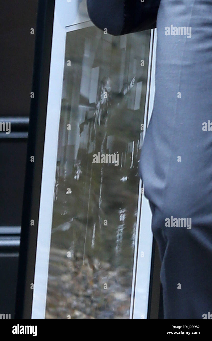 Kate Moss leaves her North London home with her driver carrying what ...