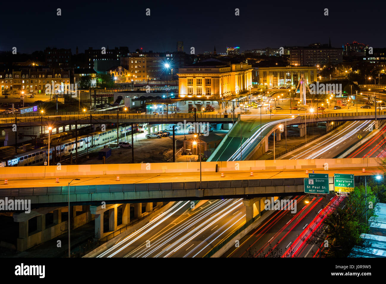 View of Penn Station and the Jones Falls Expressway at night, in ...