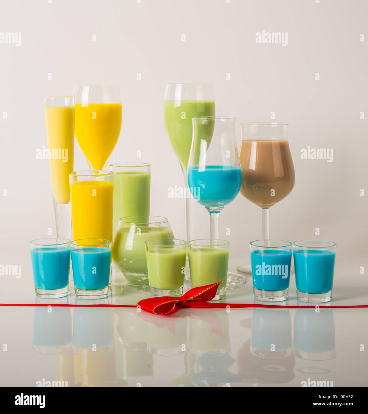 Colorful drinks based on milk liqueurs, unique pastel colors of drinks ...