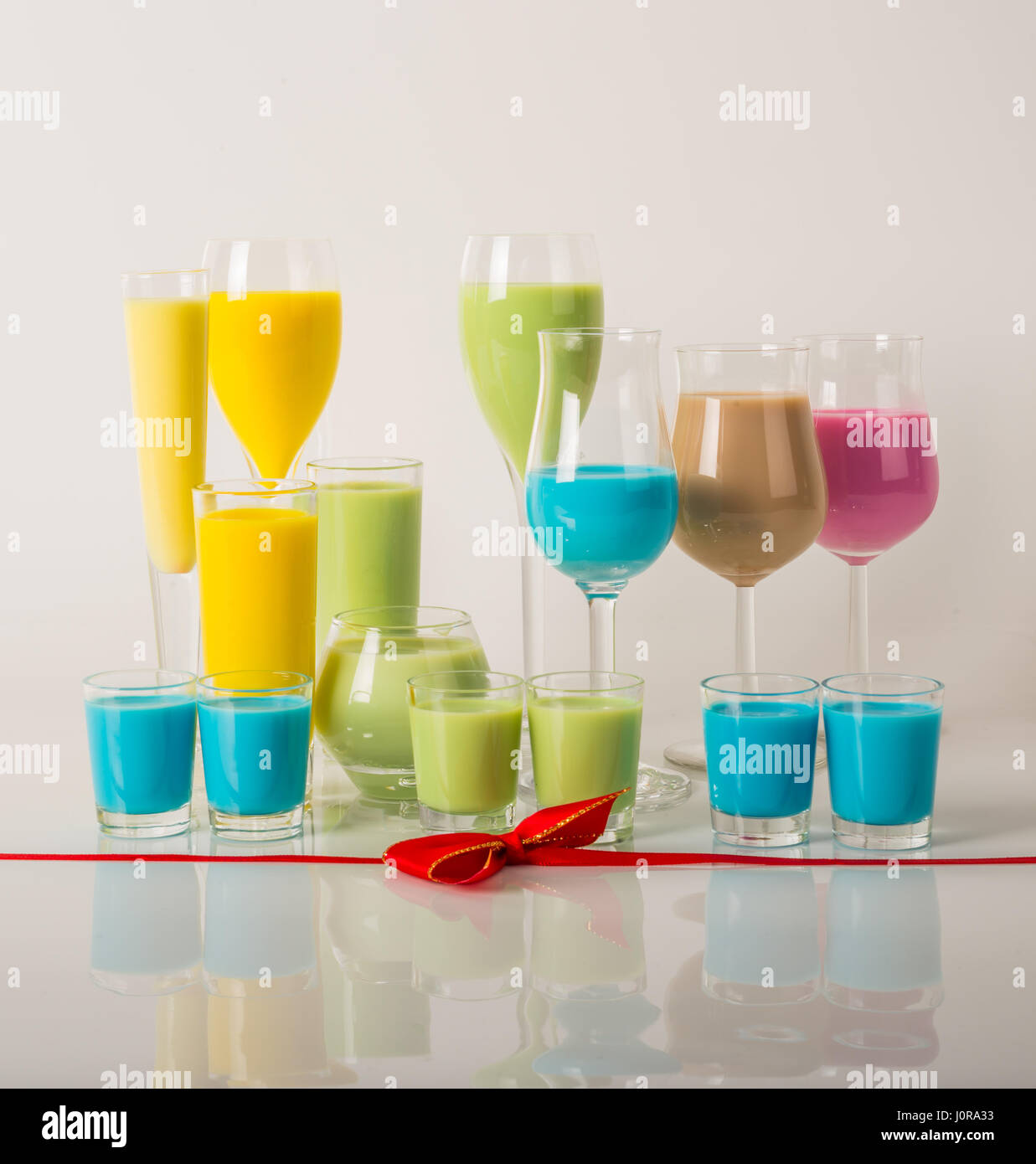 Colorful drinks based on milk liqueurs, unique pastel colors of drinks ...
