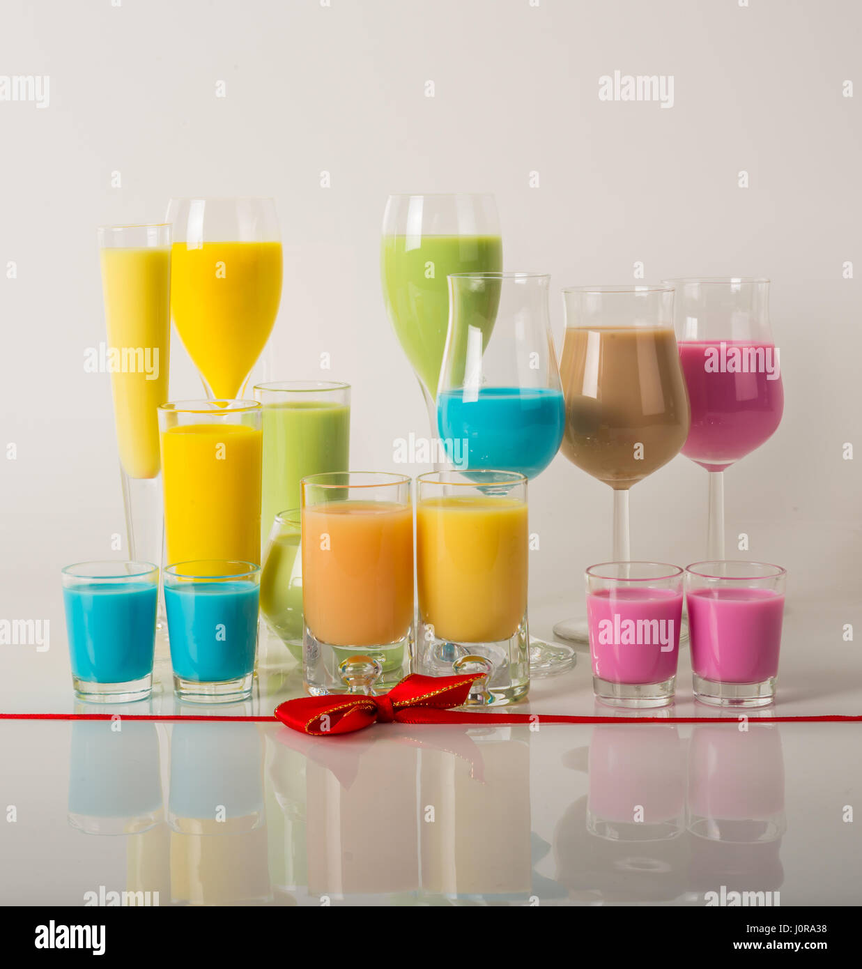Colorful drinks based on milk liqueurs, unique pastel colors of drinks ...