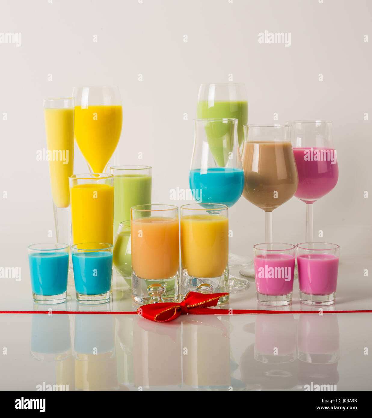 Colorful drinks based on milk liqueurs, unique pastel colors of drinks ...