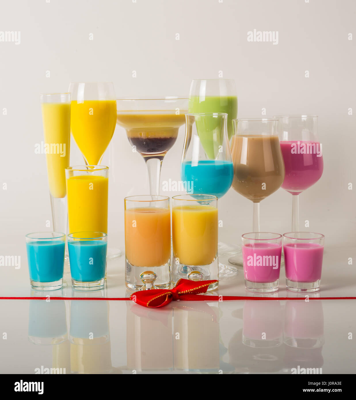 Colorful drinks based on milk liqueurs, unique pastel colors of drinks ...