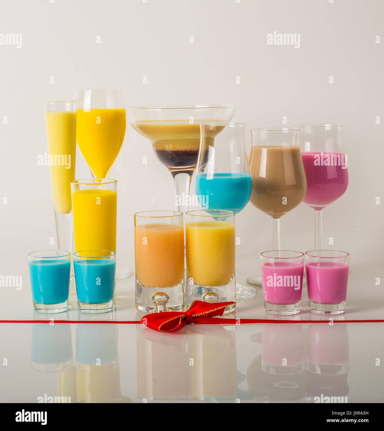 Colorful drinks based on milk liqueurs, unique pastel colors of drinks ...